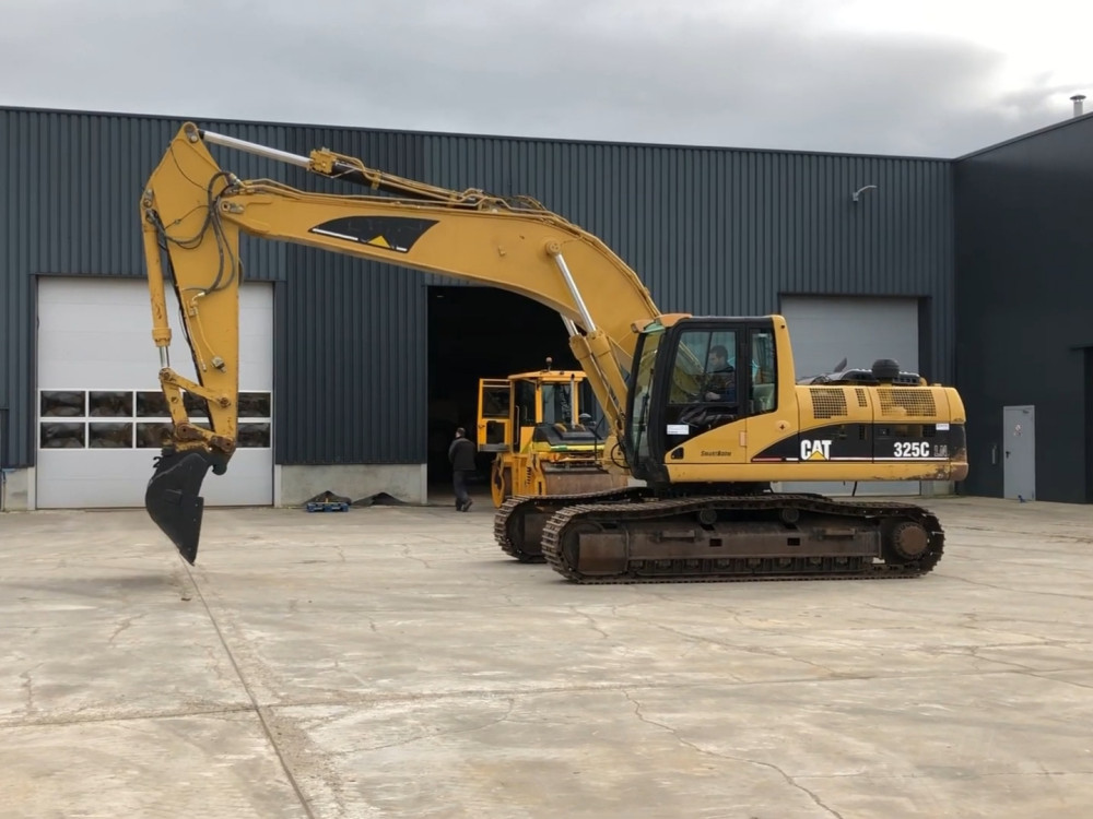 Оренда екскаватора Cat 325C від Minirent Caterpillar 325 C в оренду