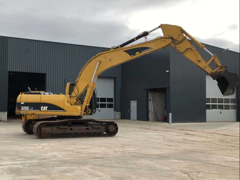 Оренда екскаватора Cat 325C від Minirent Caterpillar 325 C в оренду