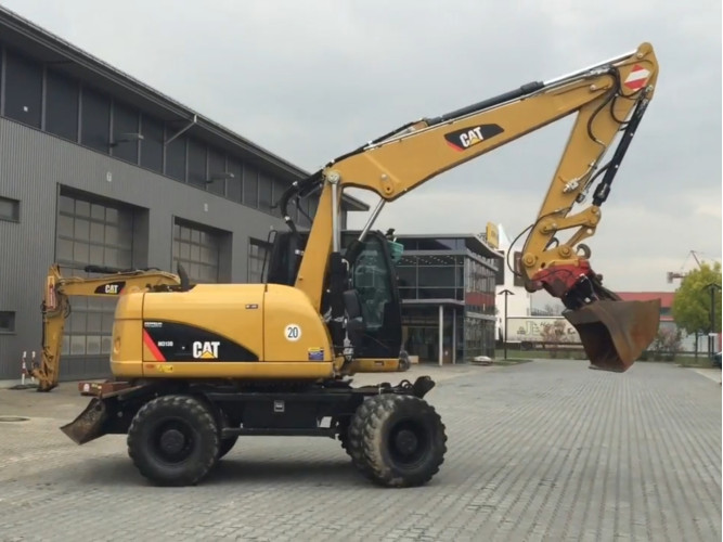 Оренда Повноповоротний екскаватор CAT M313C Київ і область